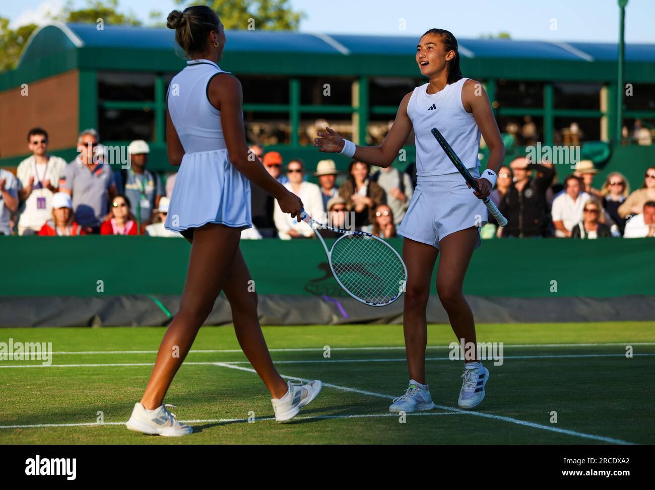Alanis Hamilton celebrates winning her doubles match with Tatum Evans ...