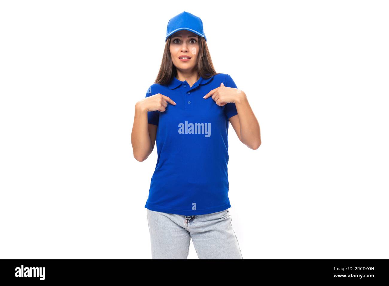 surprised young woman in blue cotton t-shirt and cap with space for ...