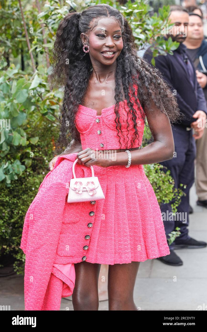 London, UK. 13th July, 2023. A guest in vibrant fuchsia Self ...