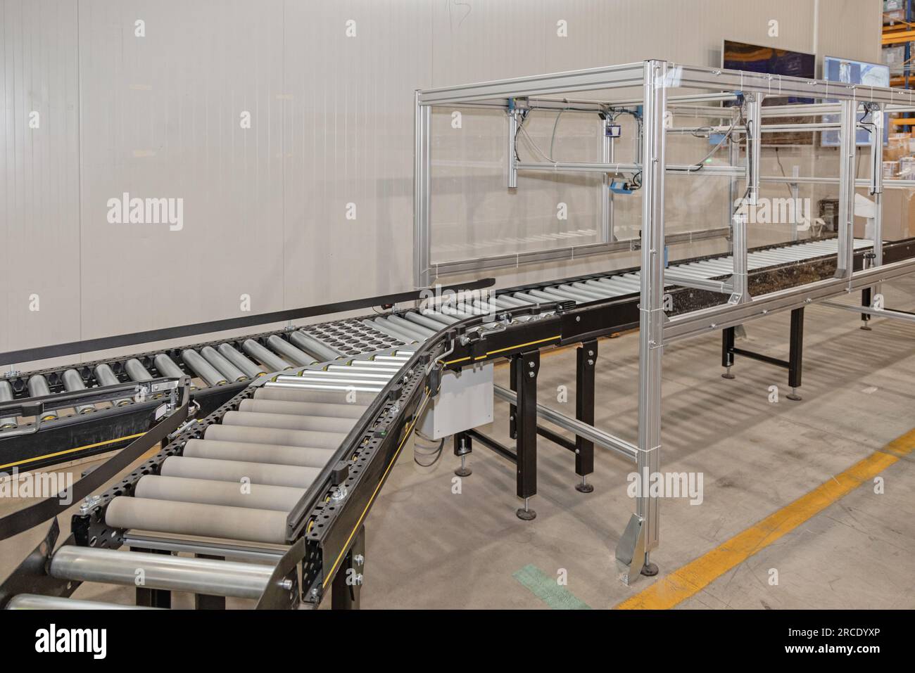 Automated Long Conveyor Sorting Rollers in Distribution Warehouse Stock ...