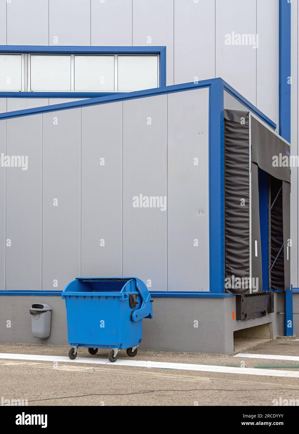 Hanging Trash Bin and Blue Wheeled Dumpster for Recycling Warehouse ...