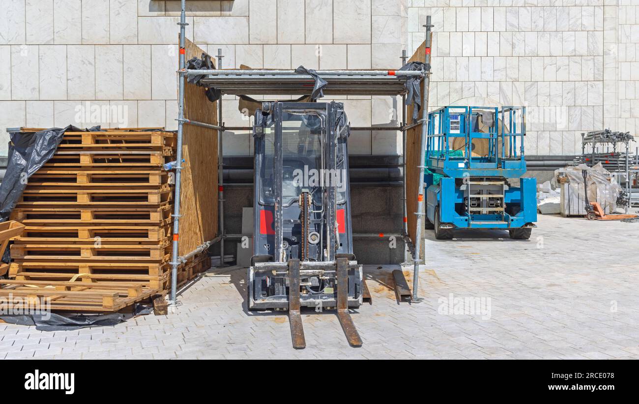 Stack of Wooden Pallets Forklift in Scaffoldings Garage Platform ...