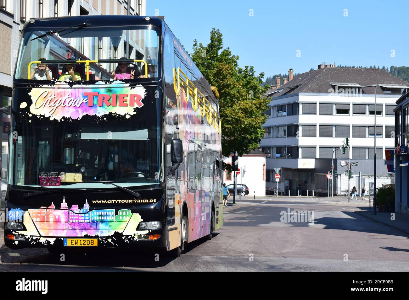 Touristic City Tour vehicles in Trier Stock Photo - Alamy