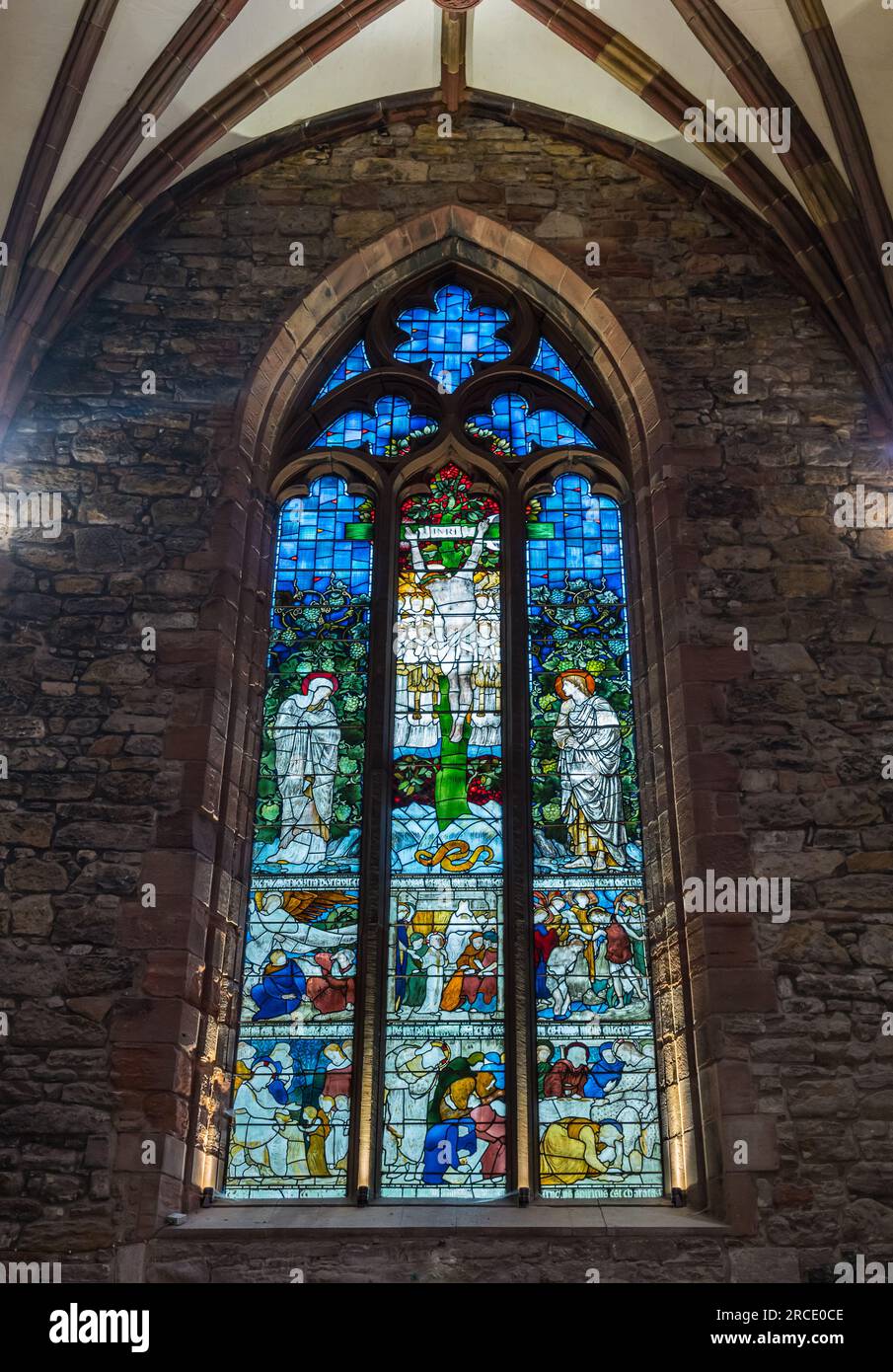 Stained glass window with religious scene of Jesus crucifixion, St Mary ...