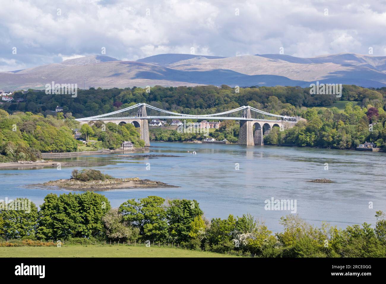 Menai Suspension Bridge crossing the Menai Strait from the Isle of ...