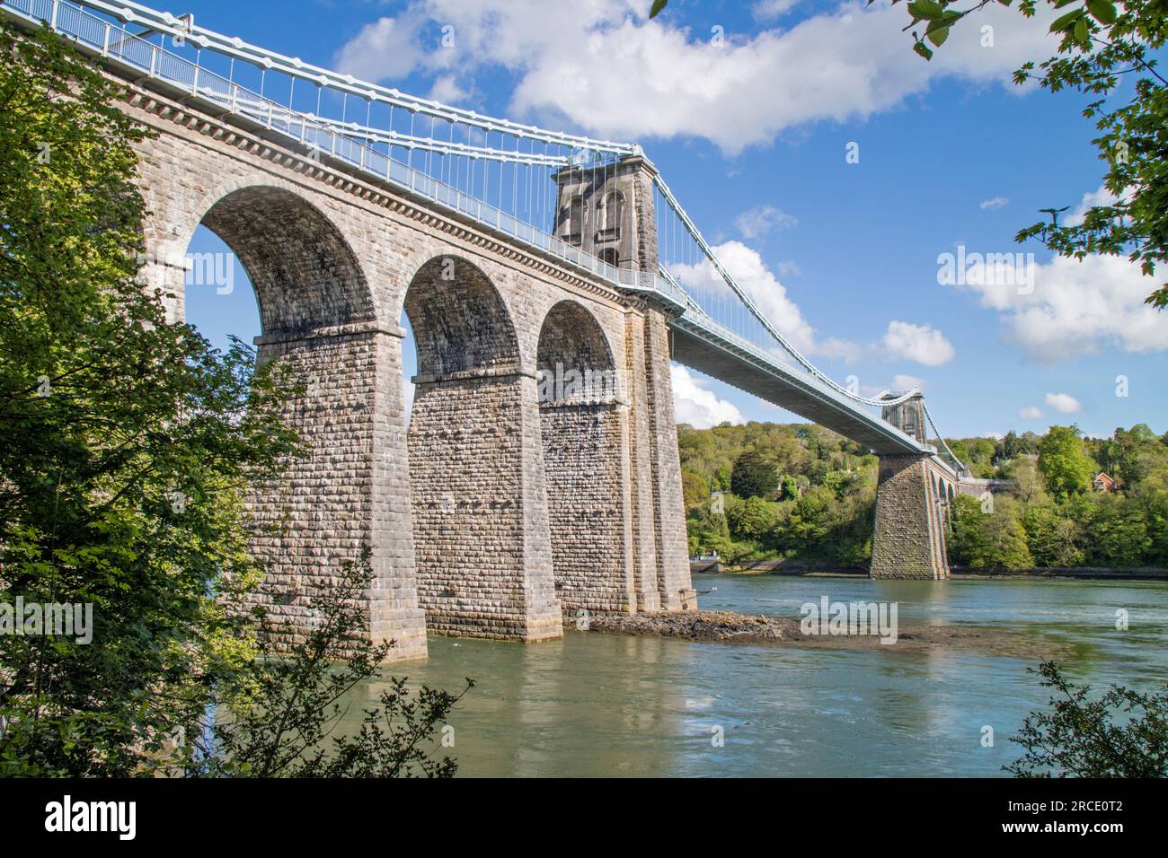 Menai Suspension Bridge crossing the Menai Strait from the Isle of ...