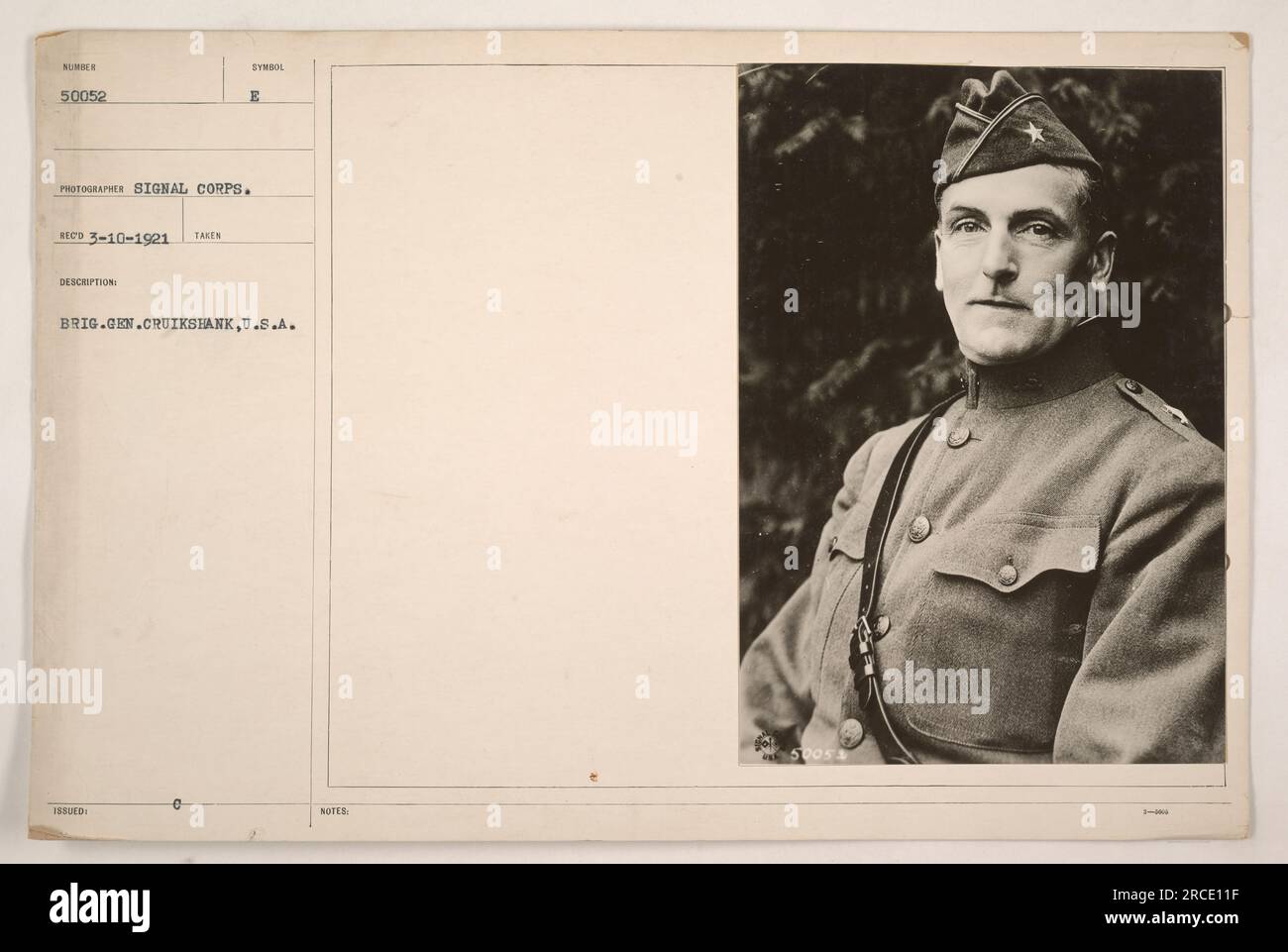 Brig. Gen. Cruikshank, U.S.A., receiving award symbol E issued by the U ...