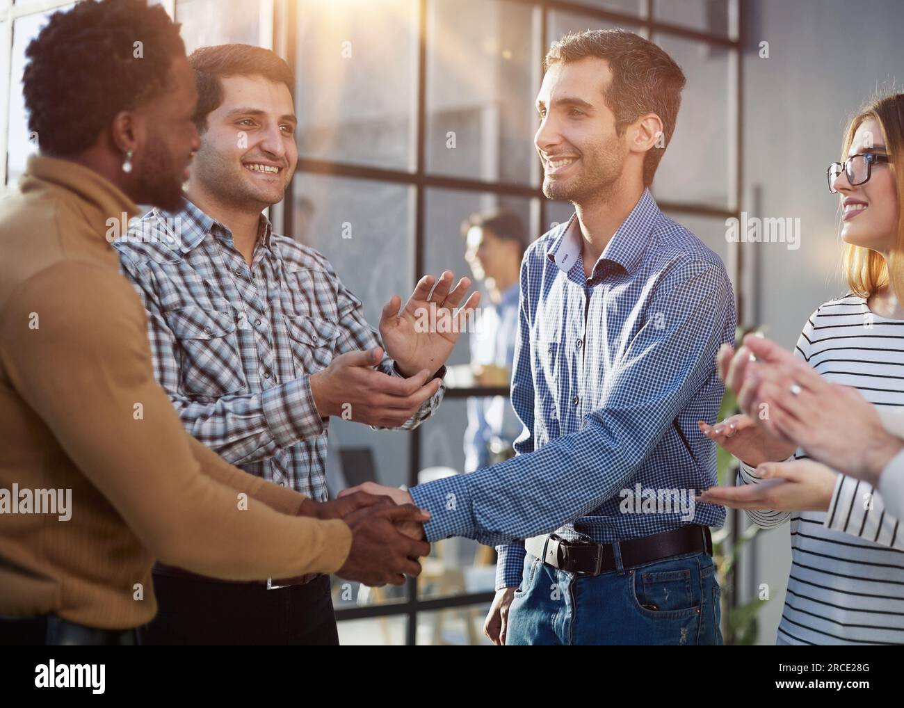 Two happy diverse professional business men executive leaders shaking ...