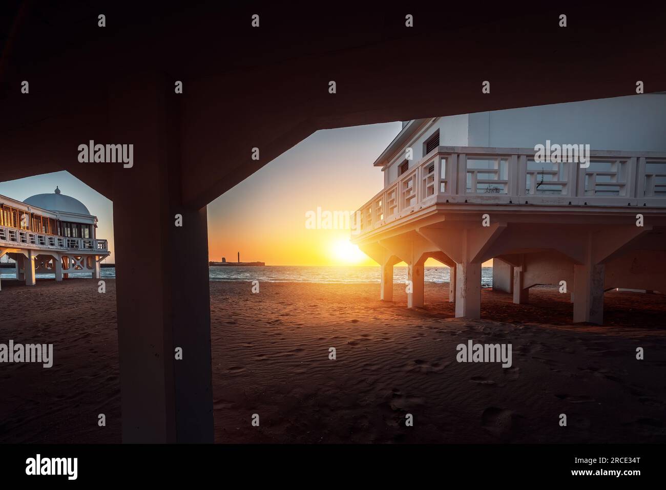 Balneario de la Palma Building at La Caleta Beach at sunset - Cadiz ...