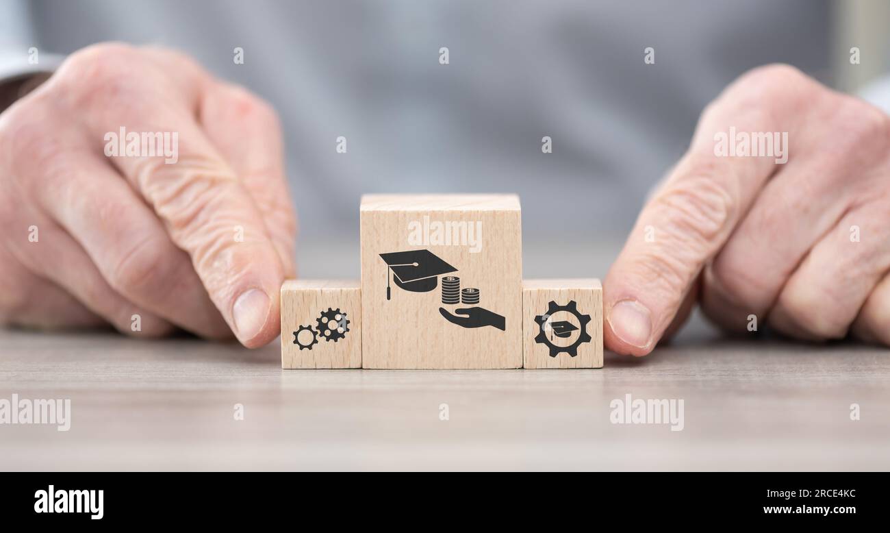 Wooden blocks with symbol of fafsa concept Stock Photo - Alamy