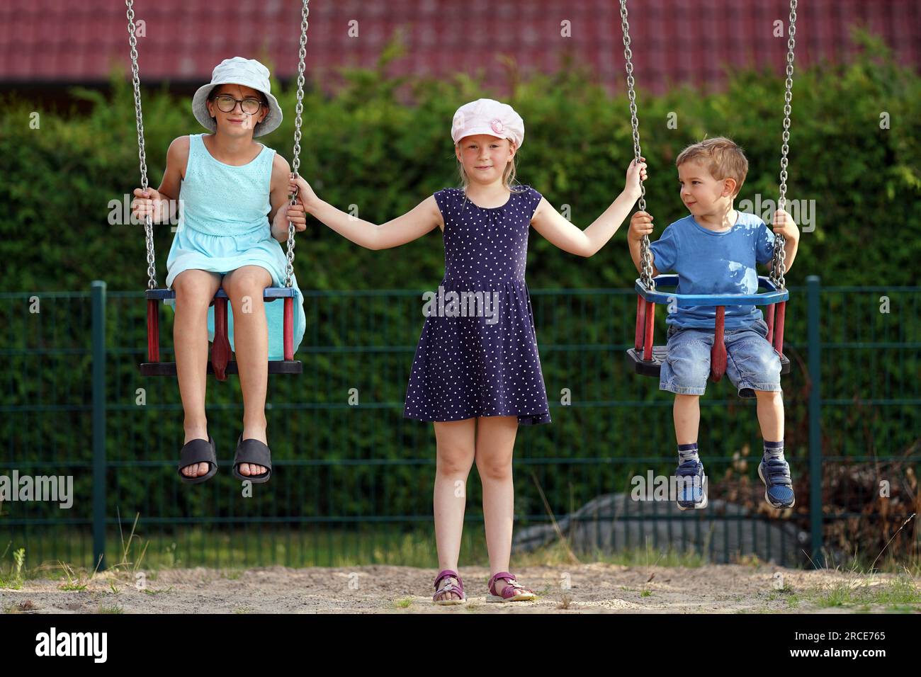 Neighborhood park kids swings hi-res stock photography and images - Alamy