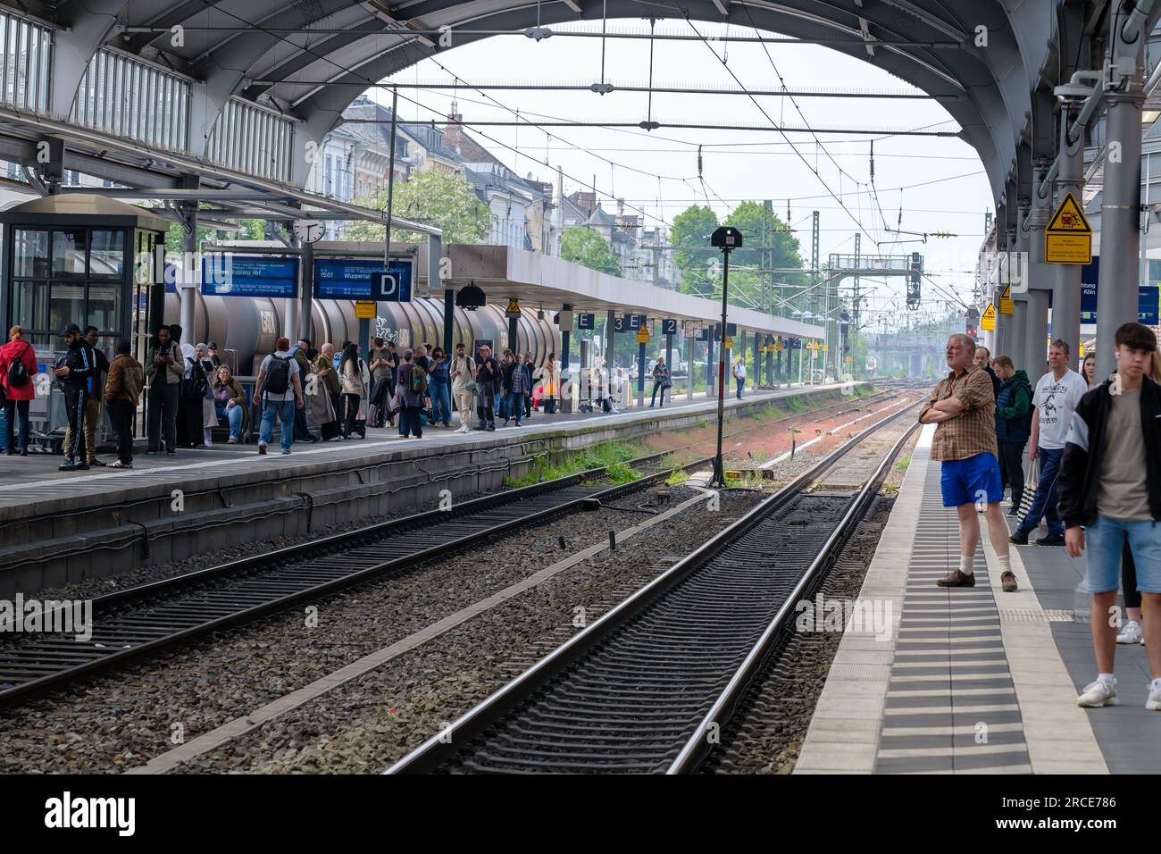 Bonn, Germany - May 22, 2023 : View of various people waiting at the ...