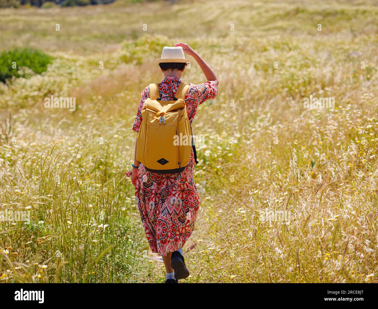 summer trip to Rhodes island, Greece. Young Asian woman in ethnic red ...