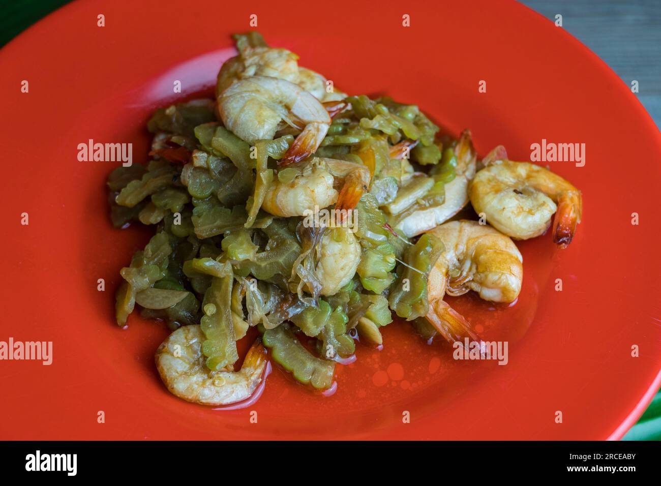 Indonesian spicy stir fried dish that combines bitter gourd with ...