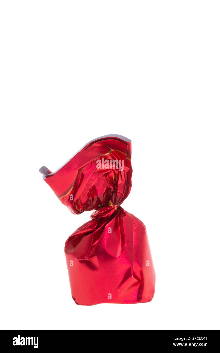 chocolate candies in red wrapper isolated on white background Stock ...