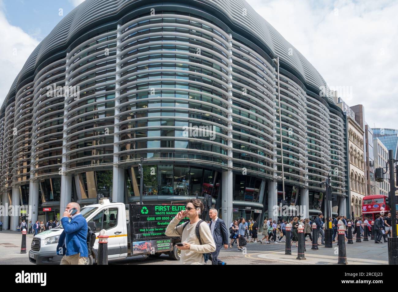Cannon Street busy with city workers at lunch time. The Wallbrook ...