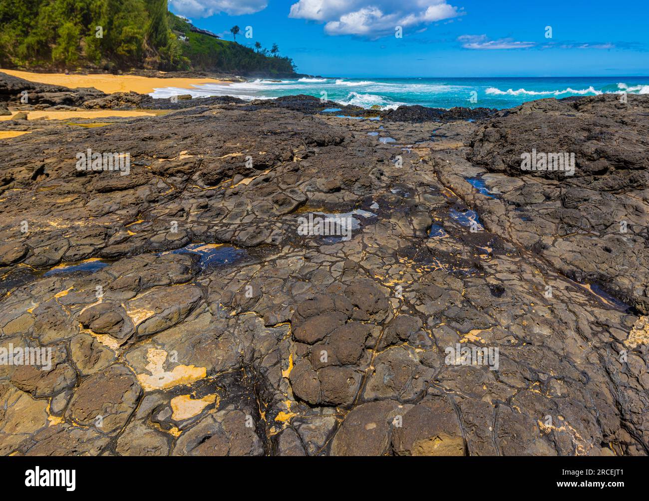 Waves Crash Over Exposed Lava Reef, Kauapea Beach, Kauai, Hawaii, USA ...