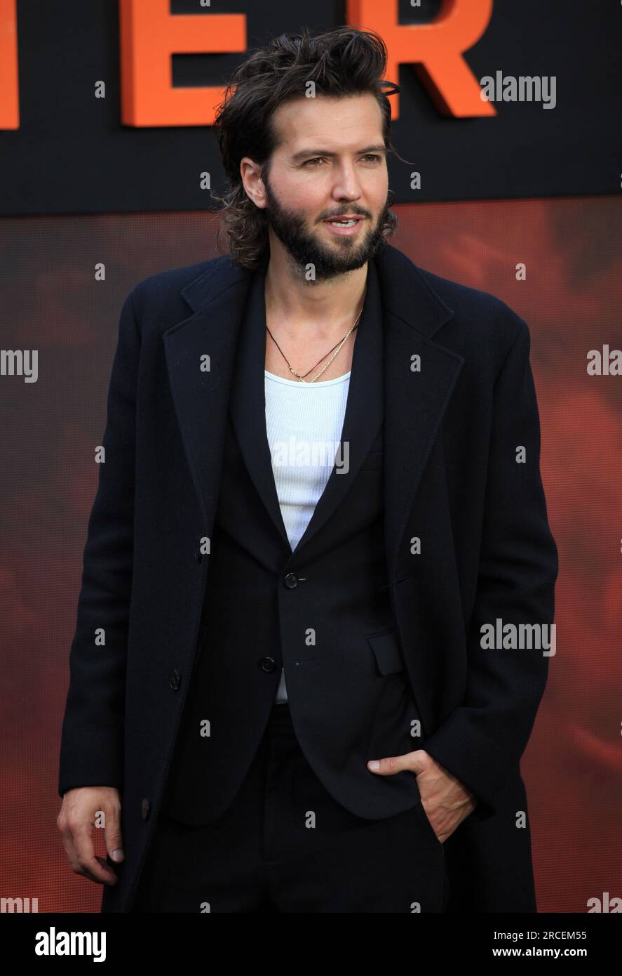 London, UK. Guy Burnet at the Oppenheimer Premiere. Odeon Luxe ...