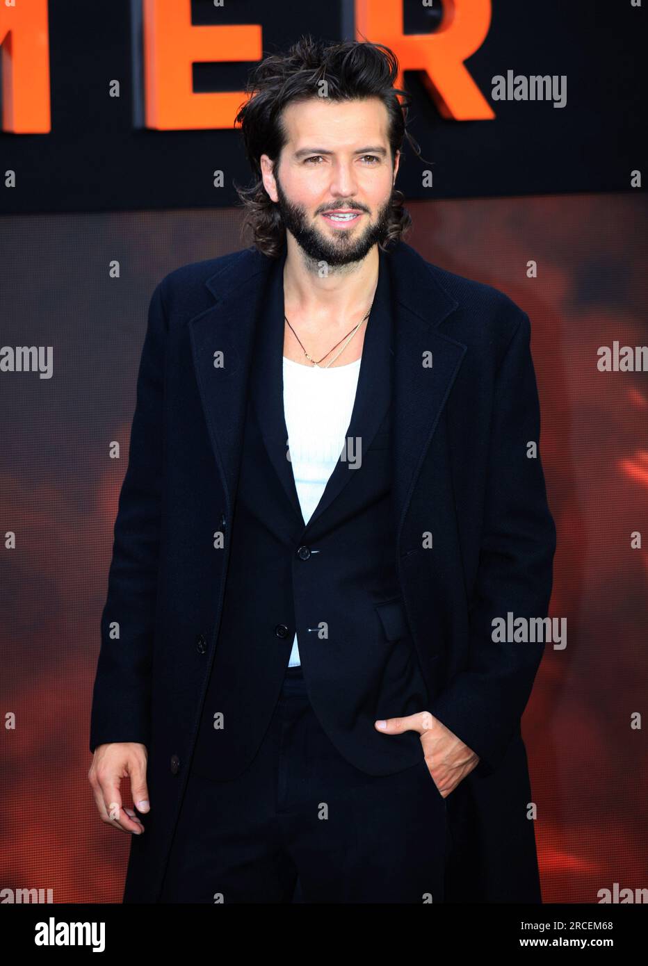 London, UK. Guy Burnet at the Oppenheimer Premiere. Odeon Luxe ...