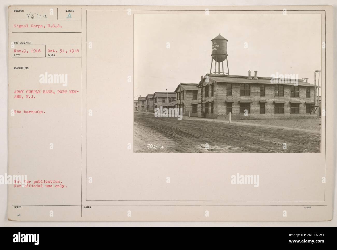 The image depicts barracks at the Sumber Army Supply Base in Port ...