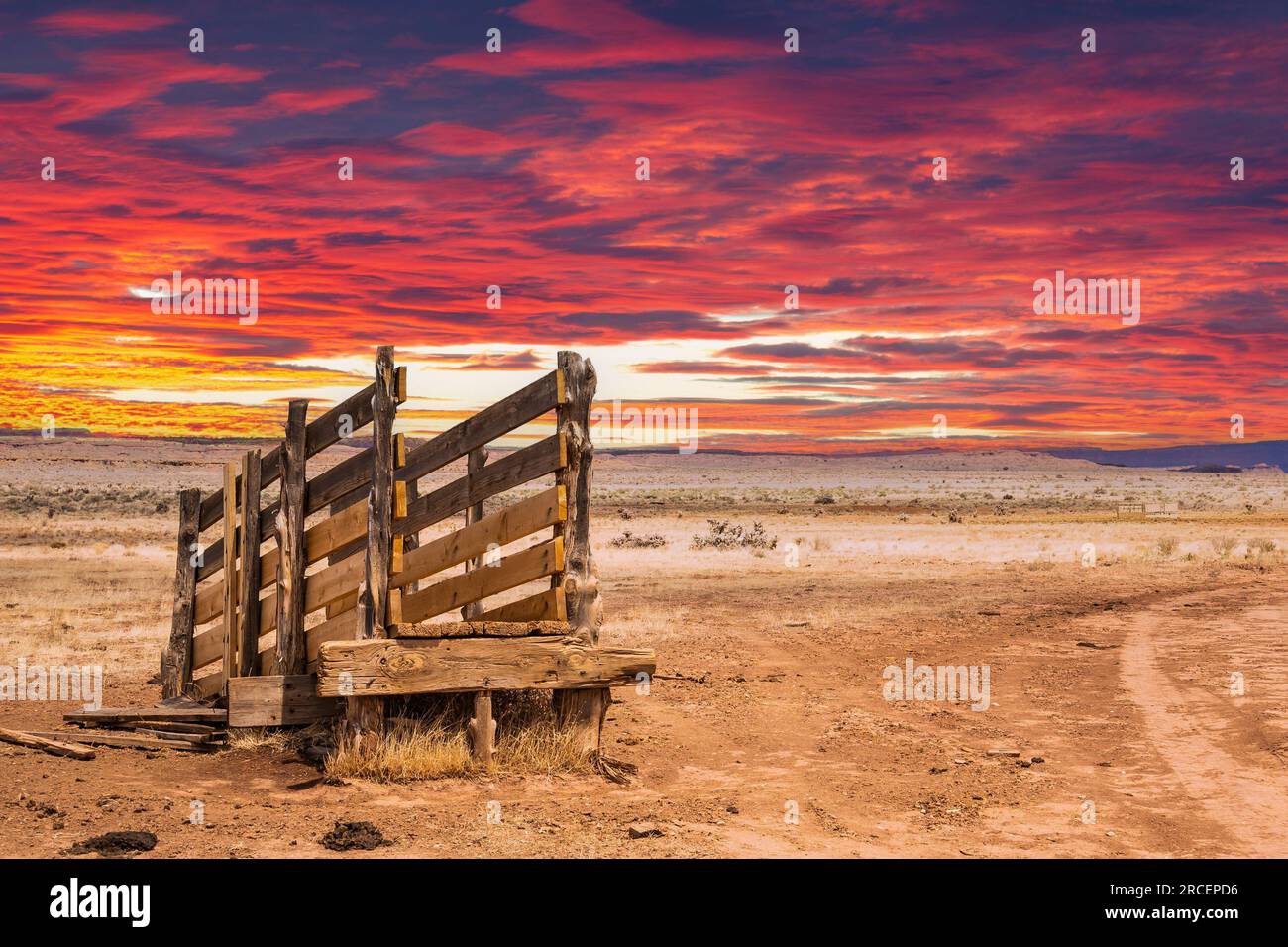 An old corral, abandoned in the desert of Arizona under a blue sky with ...