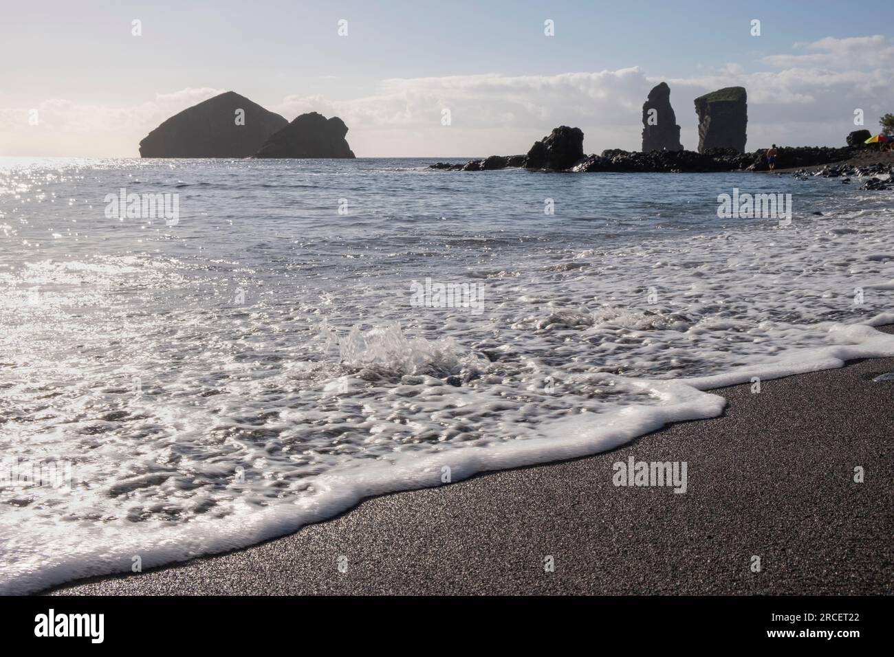 Black sand beach in Mosteiros, with the Big Cliffs in the Background ...