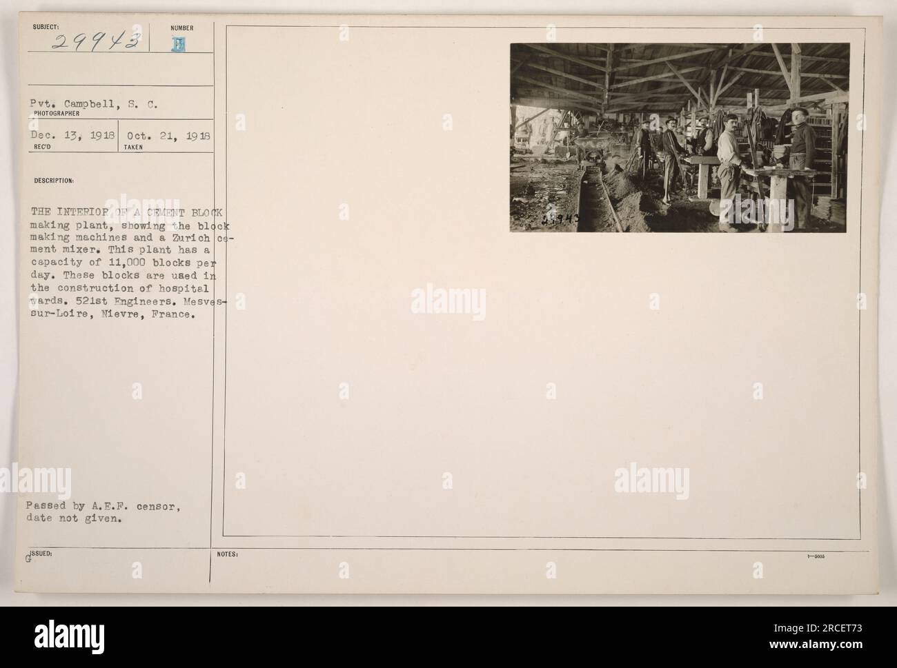 Interior view of a cement block making plant, showcasing the block ...