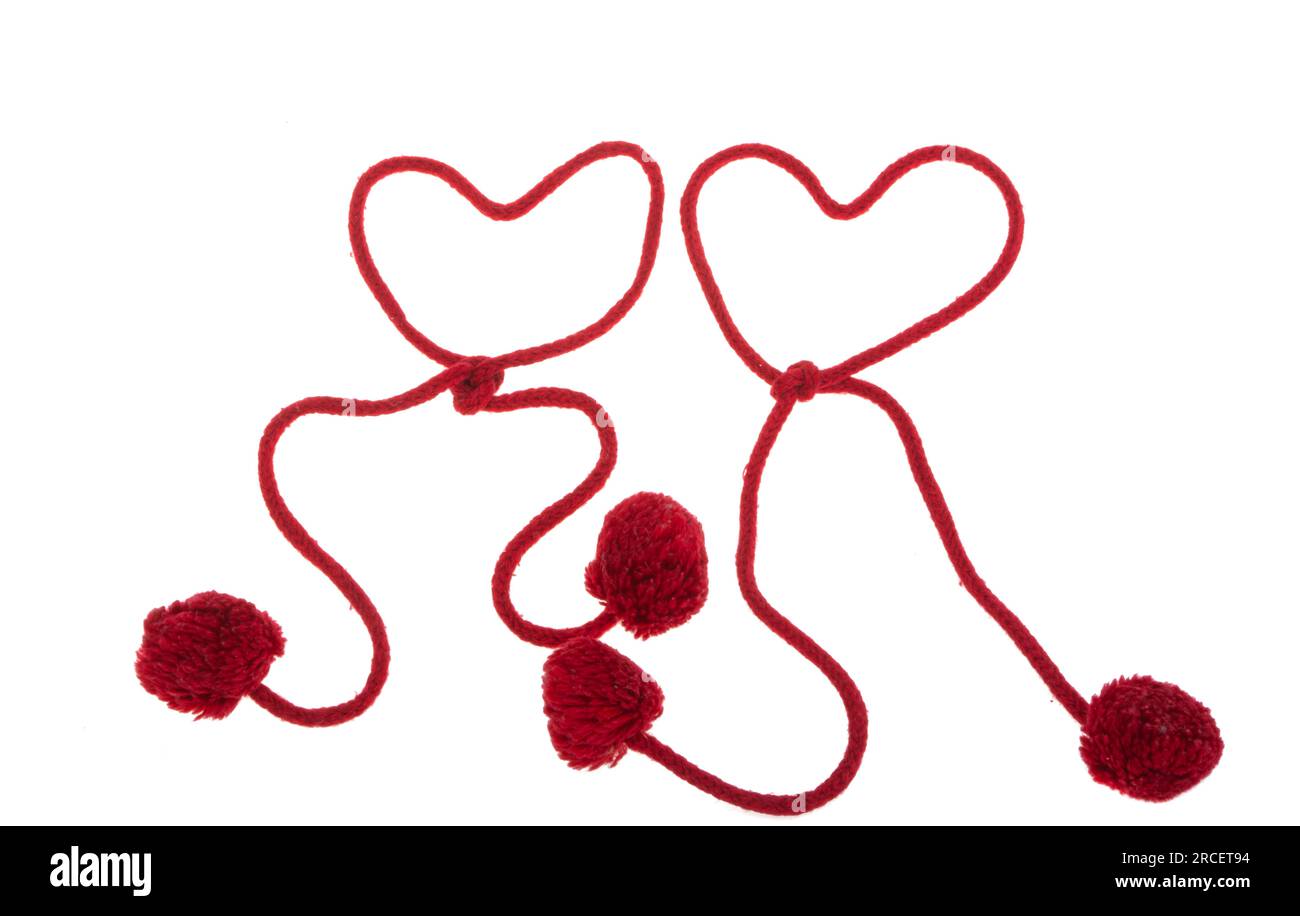 red rope heart isolated on white background Stock Photo - Alamy