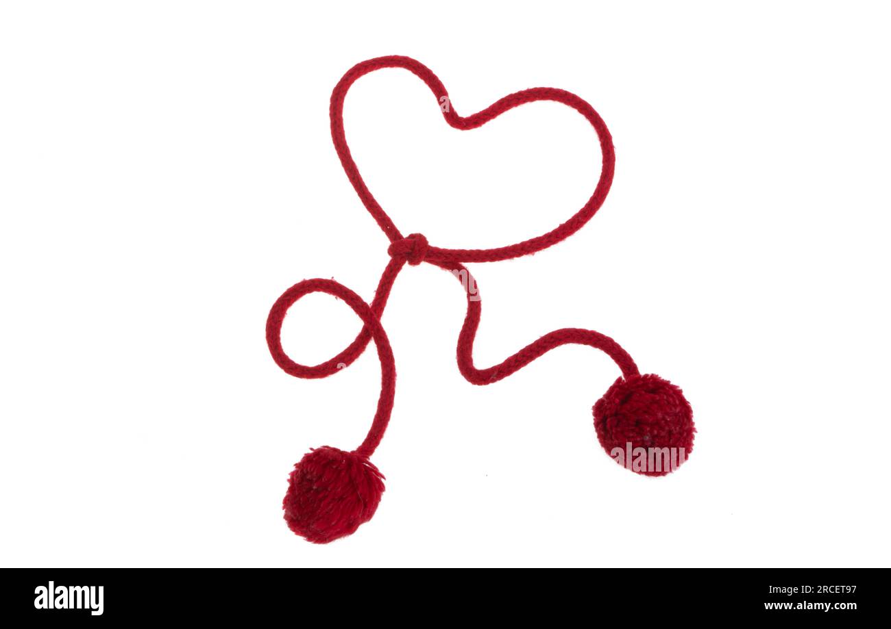 red rope heart isolated on white background Stock Photo - Alamy