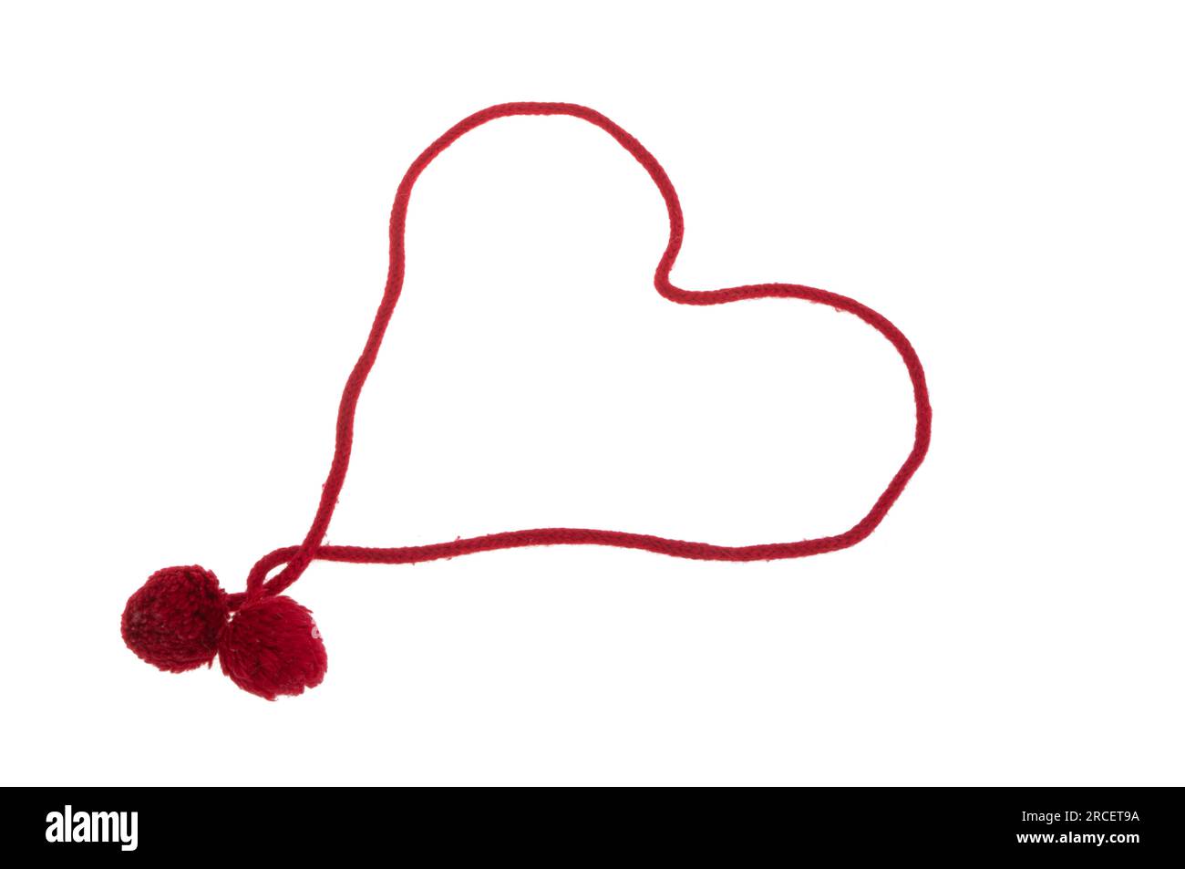 red rope heart isolated on white background Stock Photo - Alamy