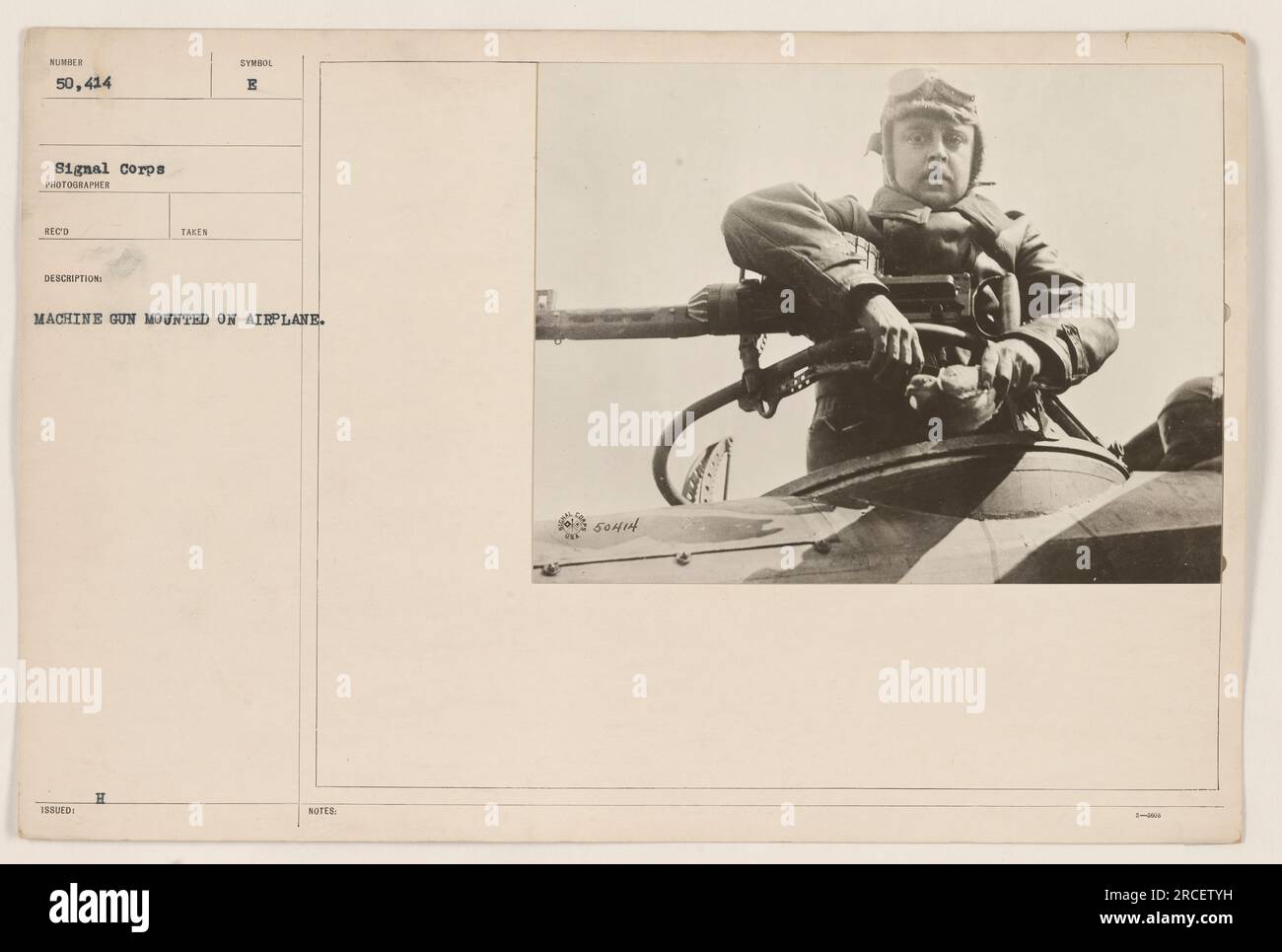 A machine gun mounted on the airplane MU 50,414, as documented in the ...