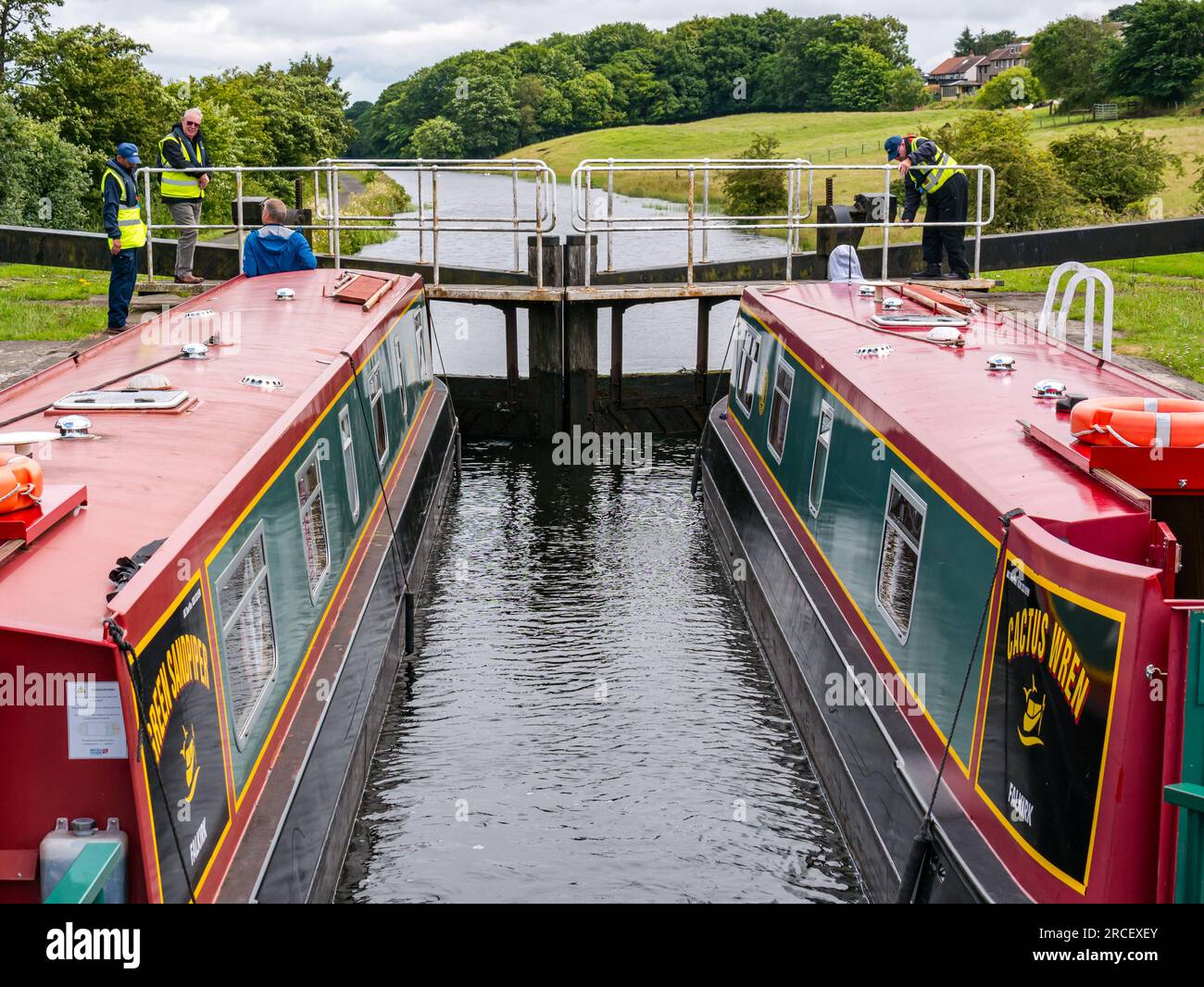 Canal boats or barges lowered in lock on Forth and Clyde Canal ...