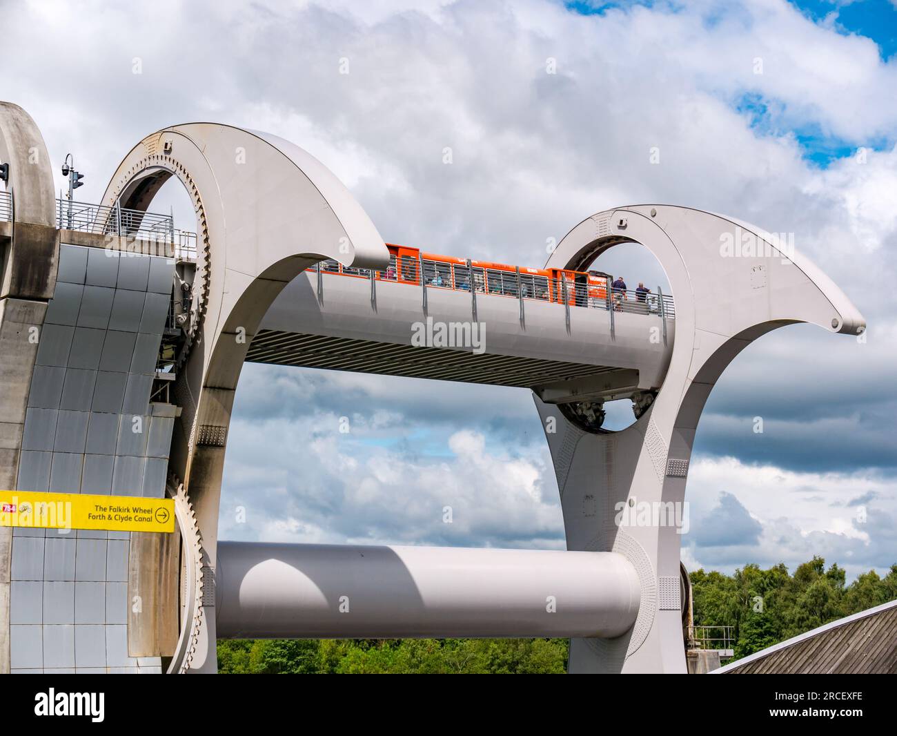Canal boat being lifted by Falkirk Wheel at junction of Union & Forth ...