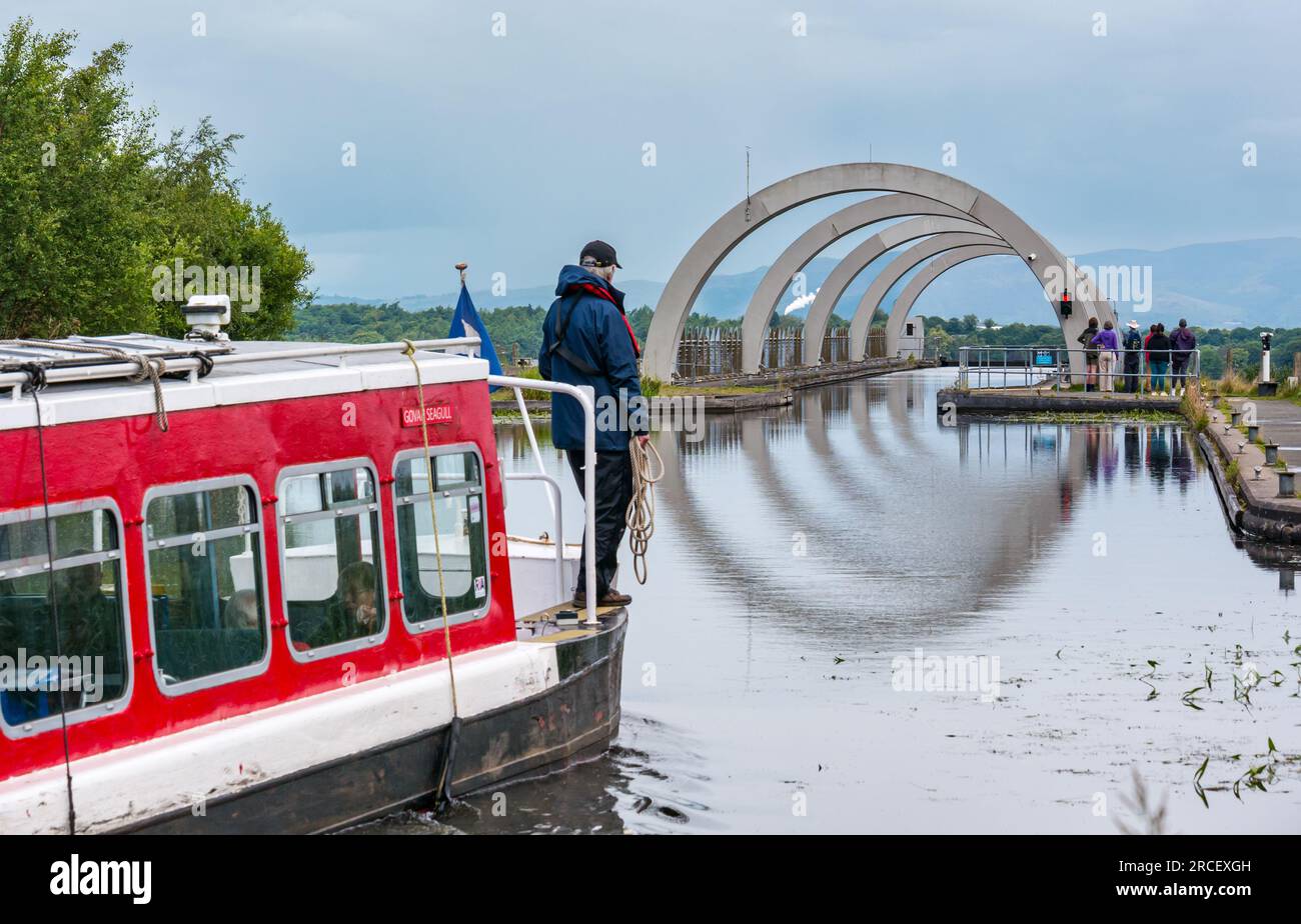 Canal boat or barge approaching Falkirk Wheel on Union Canal Scotland ...