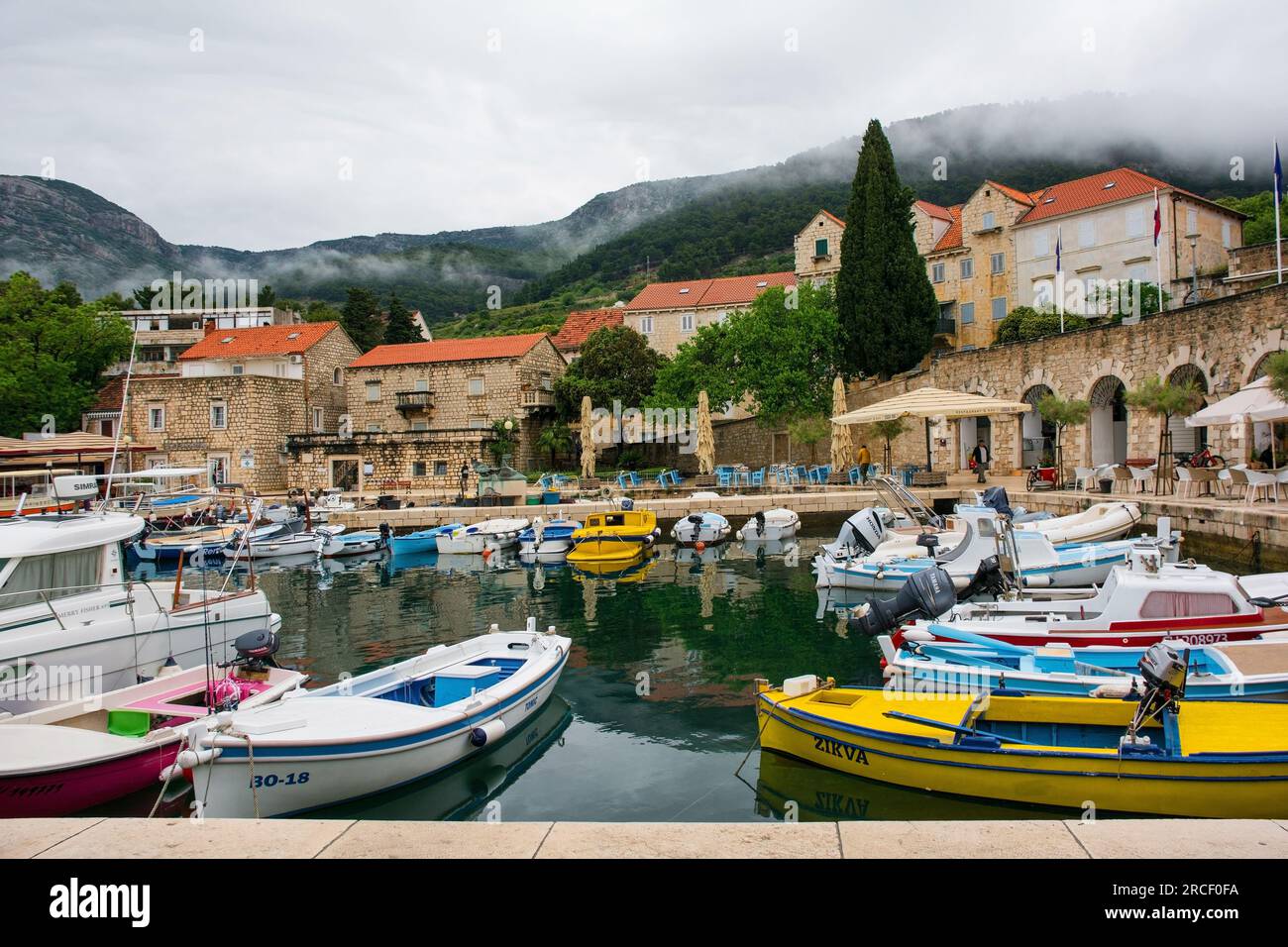 Bol, Croatia - May 15th 2023. The waterfront harbour area in Bol town ...