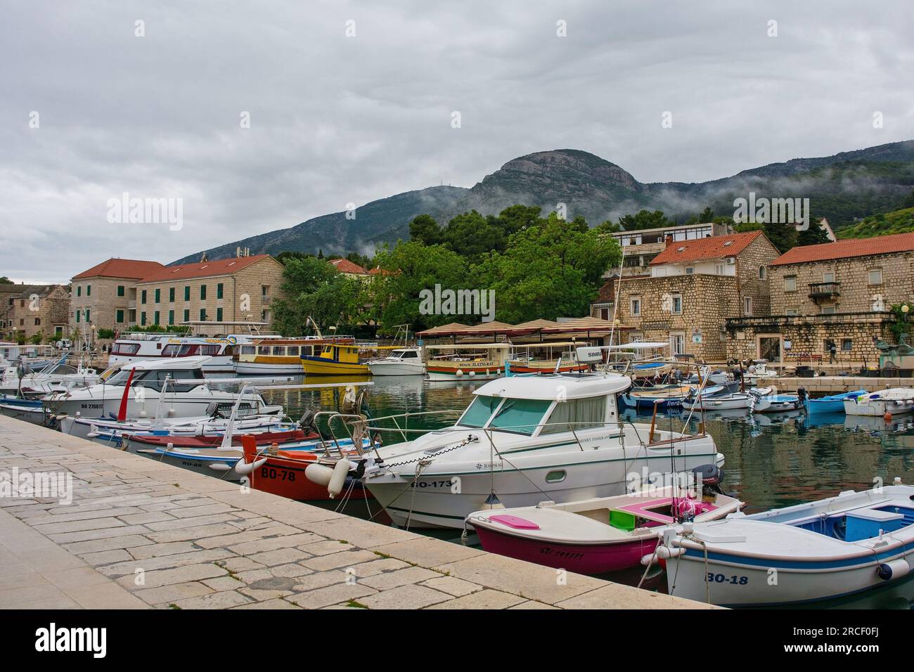 Bol, Croatia - May 15th 2023. The waterfront harbour area in Bol town ...