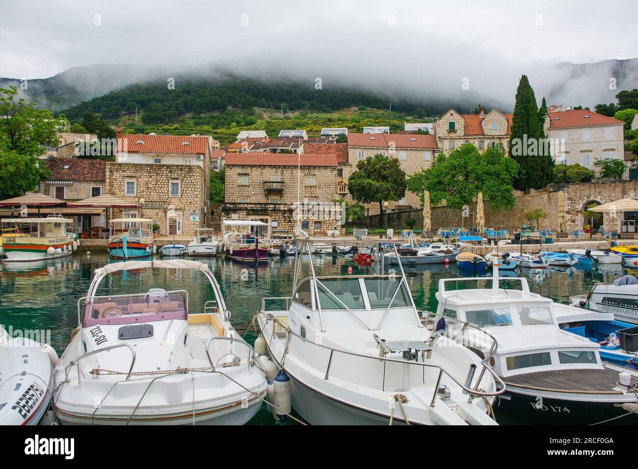 Bol, Croatia - May 15th 2023. The waterfront harbour area in Bol town ...
