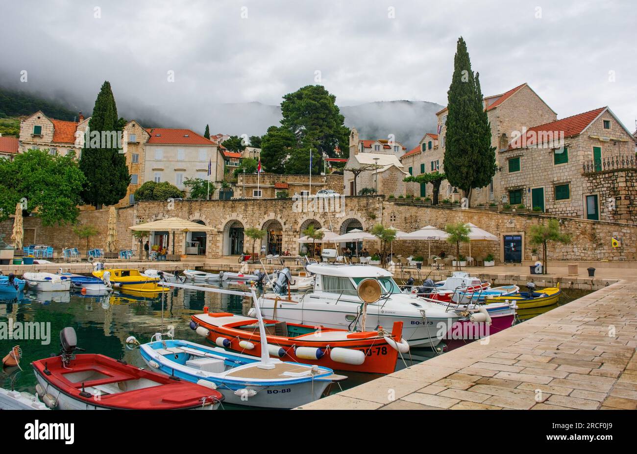 Bol, Croatia - May 15th 2023. The waterfront harbour area in Bol town ...