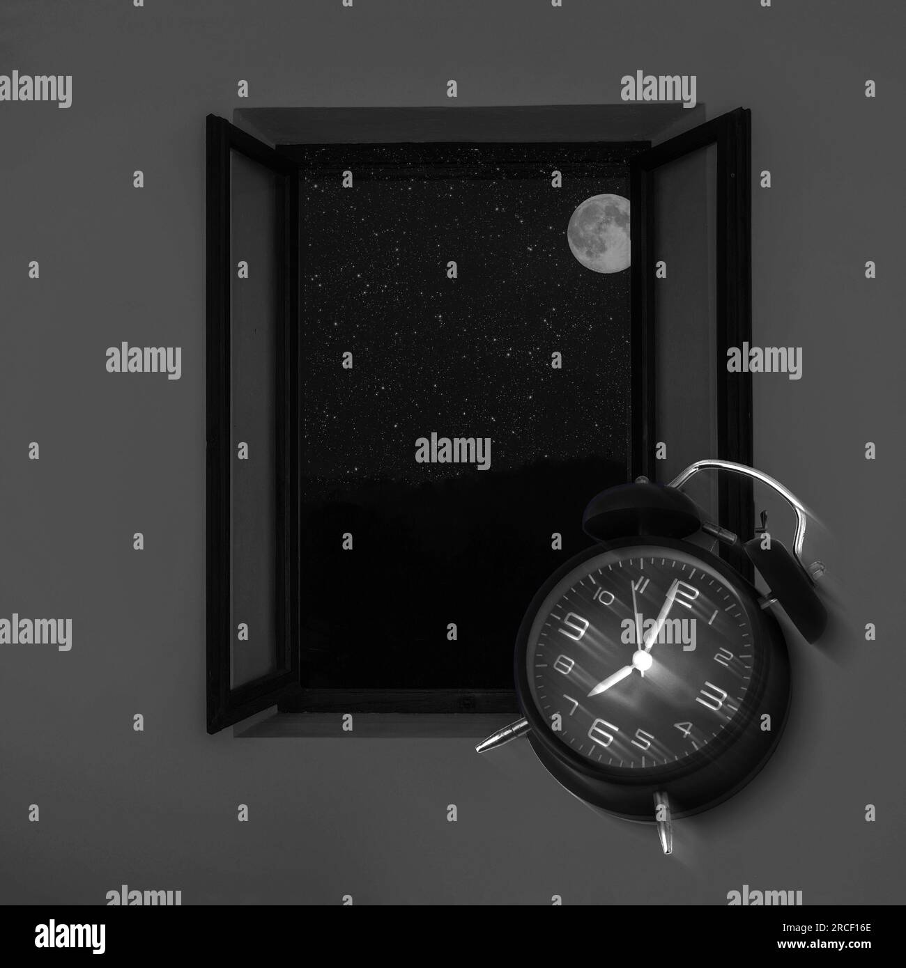 Retirement at last. Composite of alarm clock being thrown out of the ...
