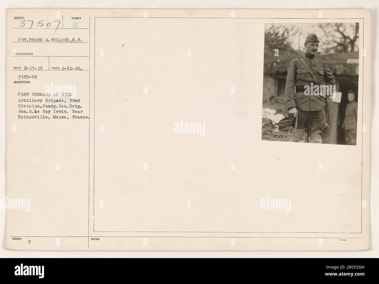 Caption: "Sgt. Frank A. Wollock, S.C., photographer, captures a moment ...