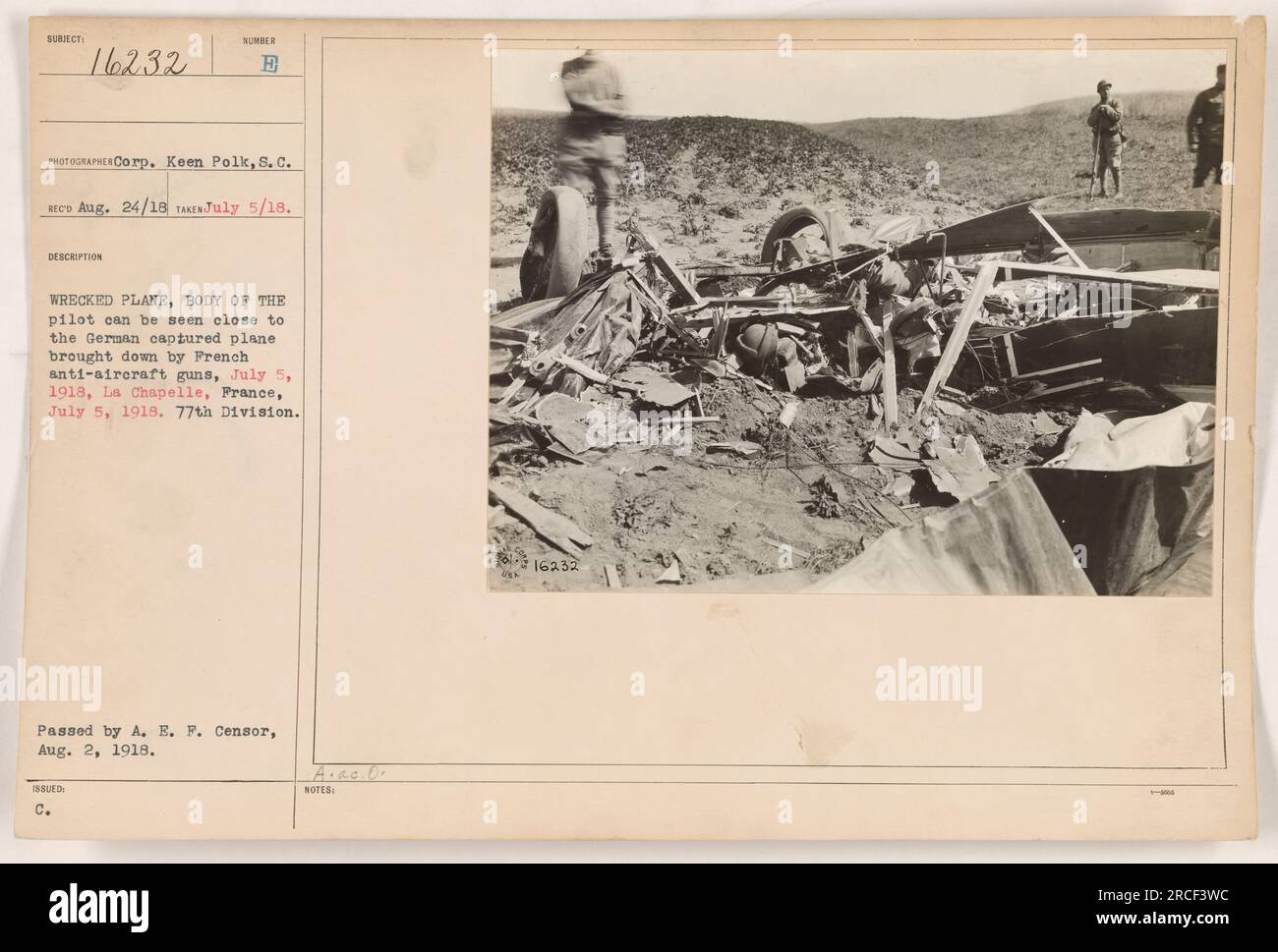 "Image showing a wrecked plane and the body of a pilot. The plane was ...