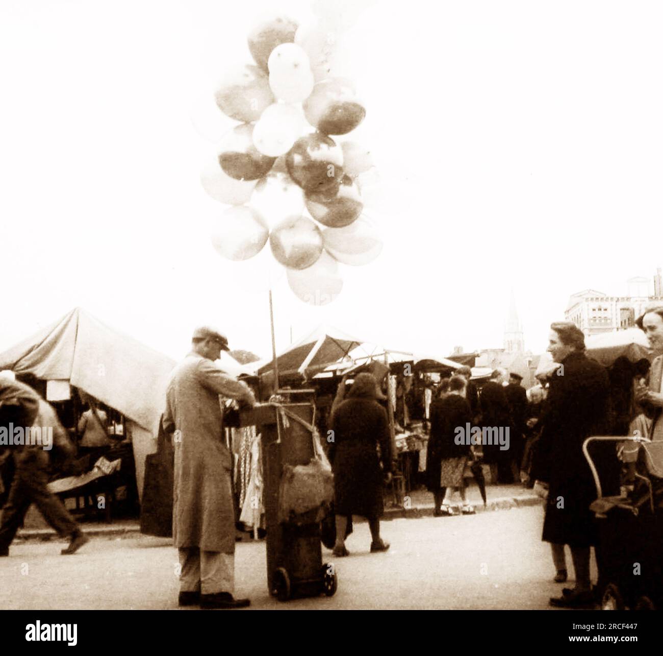 Balloon seller, Tooting Fair, London, early 1900s Stock Photo - Alamy