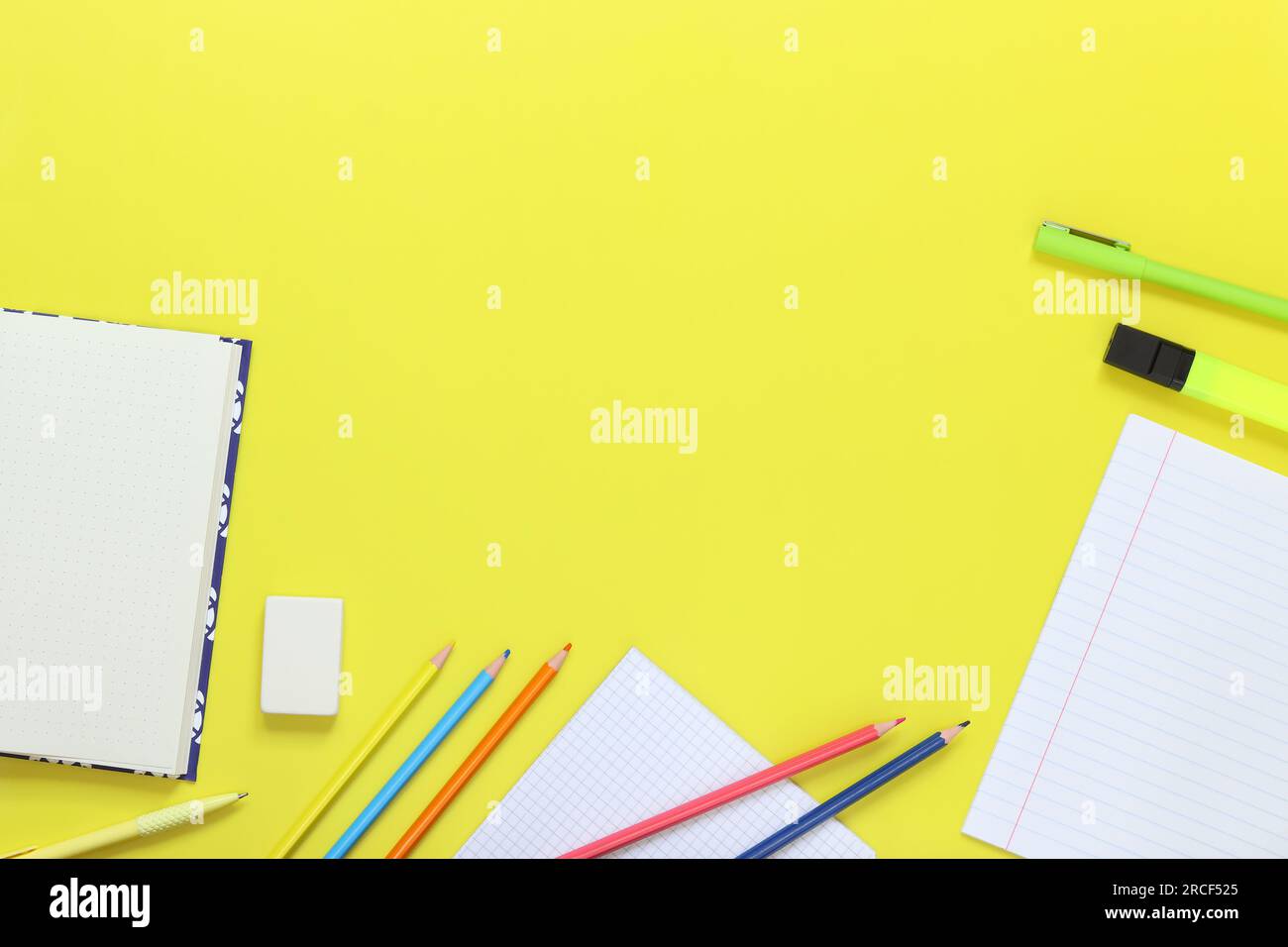Back to school. Workspace, top view, flat lay. Open notebooks, pencils ...
