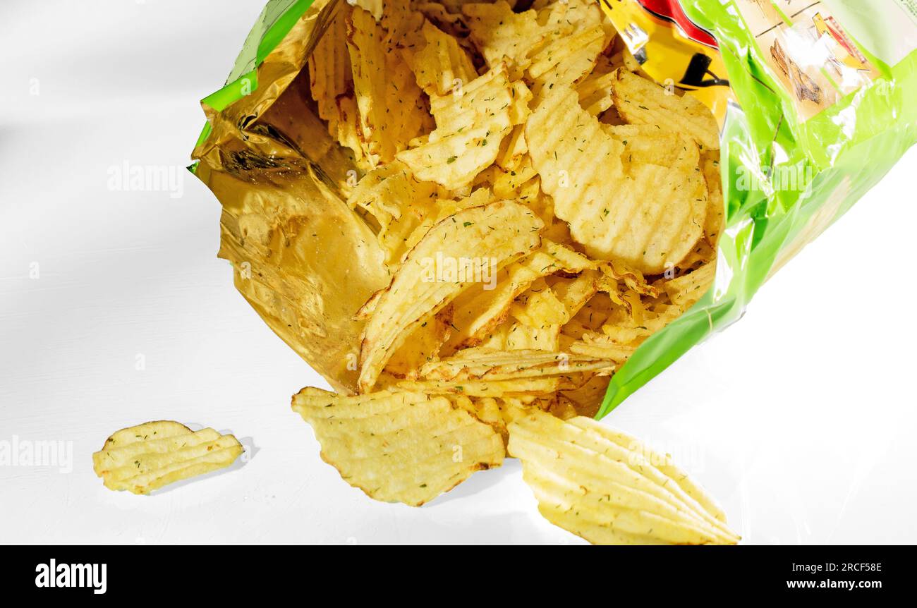 Potato chips falling hi-res stock photography and images - Alamy