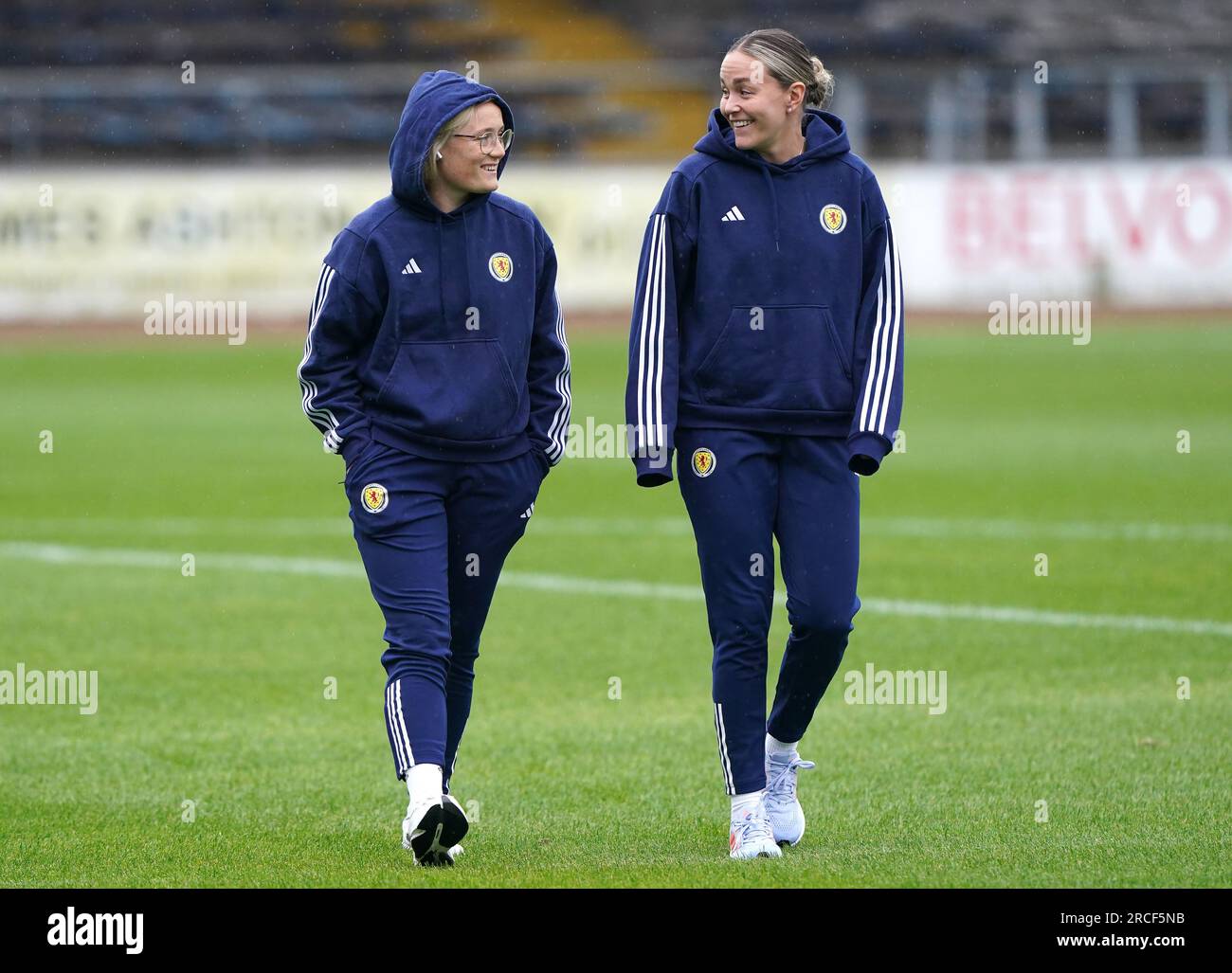Scotland's Erin Cuthbert (left) and Lee Gibson inspect the pitch ahead ...