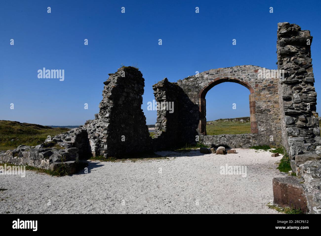 16th century ruins of St Dwynwen's church Ynys Llanddwyn Newborough ...