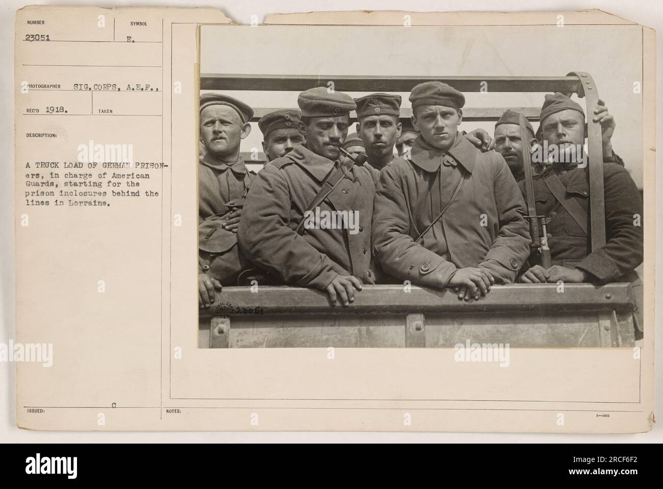 A truckload of German prisoners, under the supervision of American ...