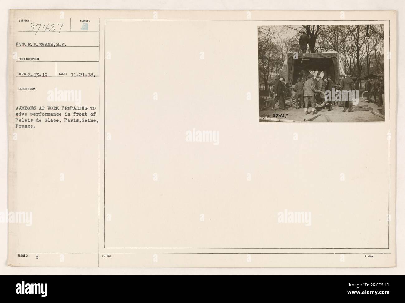 Caption: "Pvt. E. E. Evans, a Signal Corps photographer, captured this ...