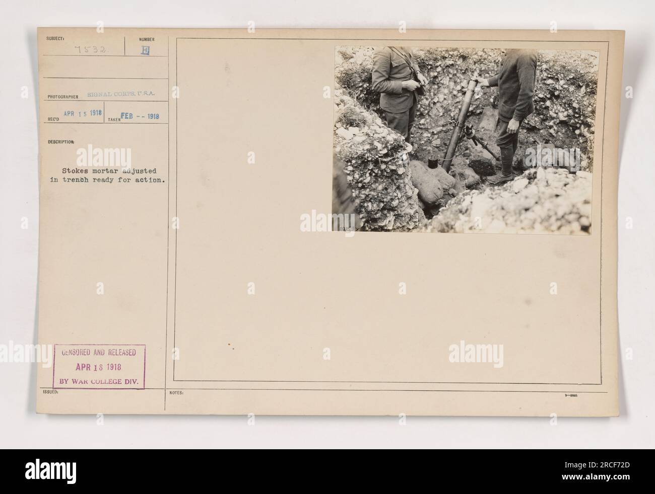 A Stokes mortar is seen adjusted and ready for action in a trench at ...