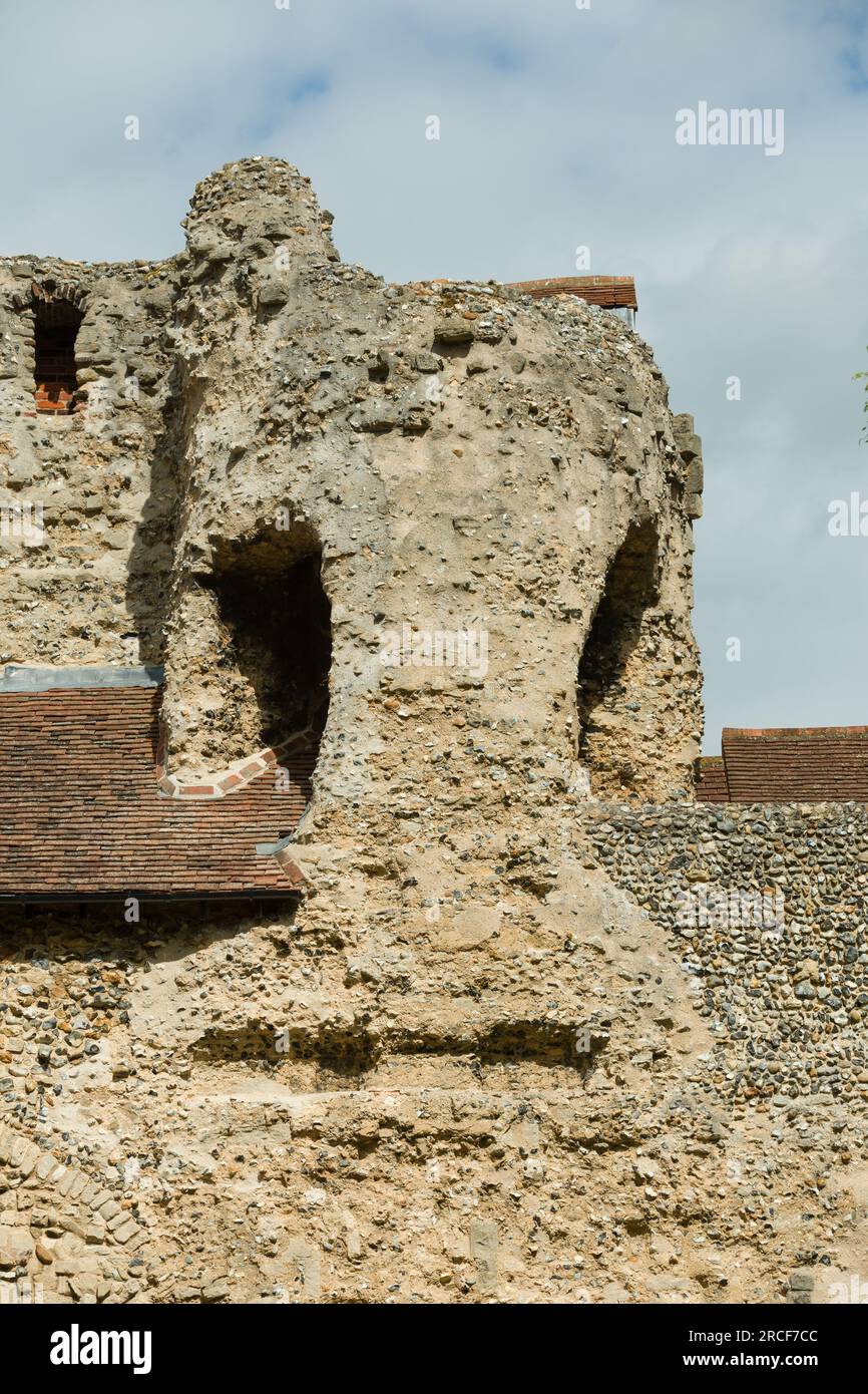 Stone flint work on building which looks like eyes and nostrils on a ...